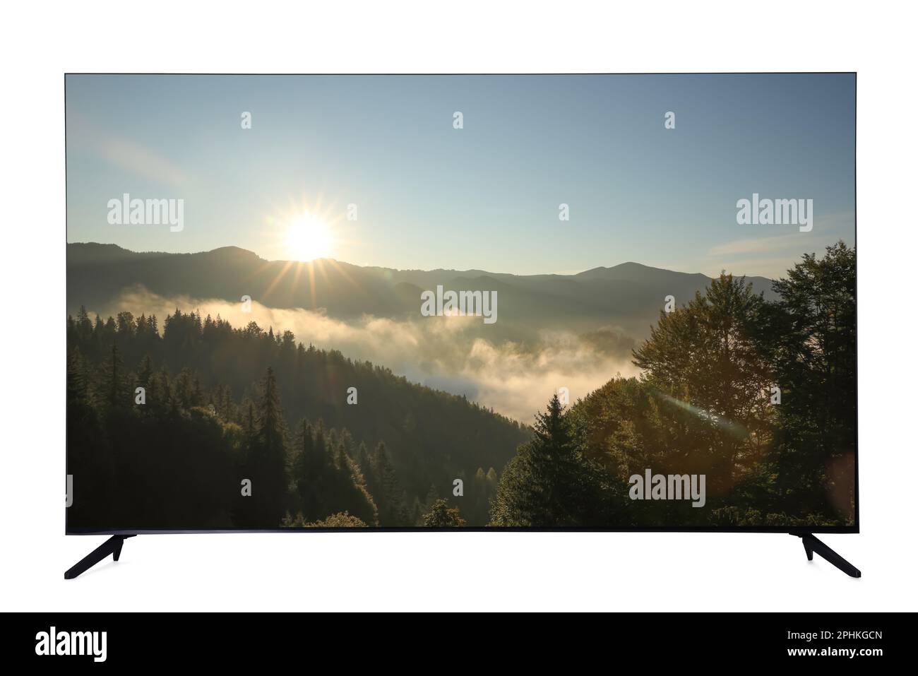 Modern wide screen TV monitor showing beautiful mountain landscape ...
