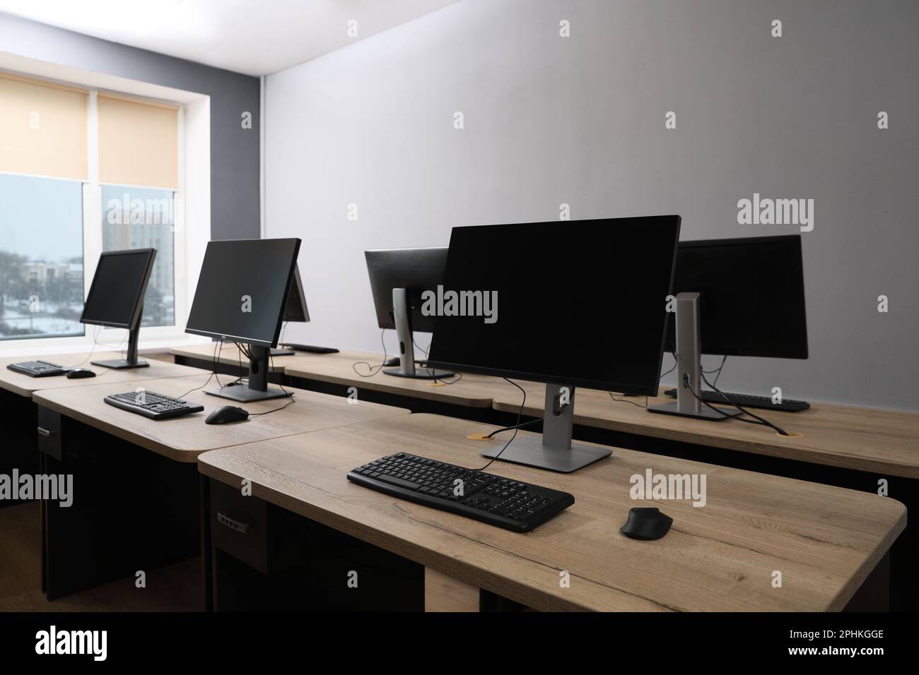 Rows of computers in empty office hi-res stock photography and images ...