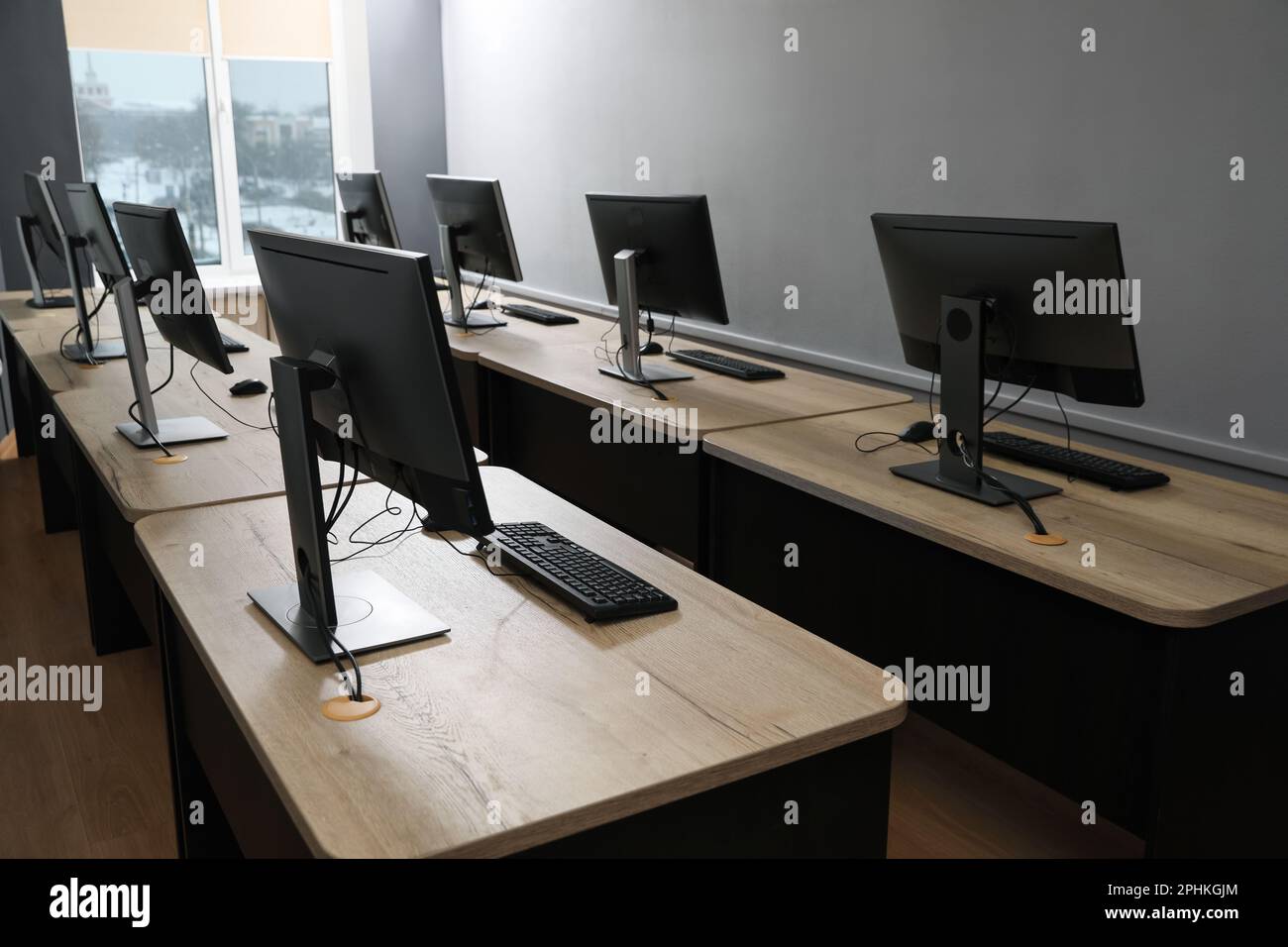 Many modern computers in open space office Stock Photo - Alamy