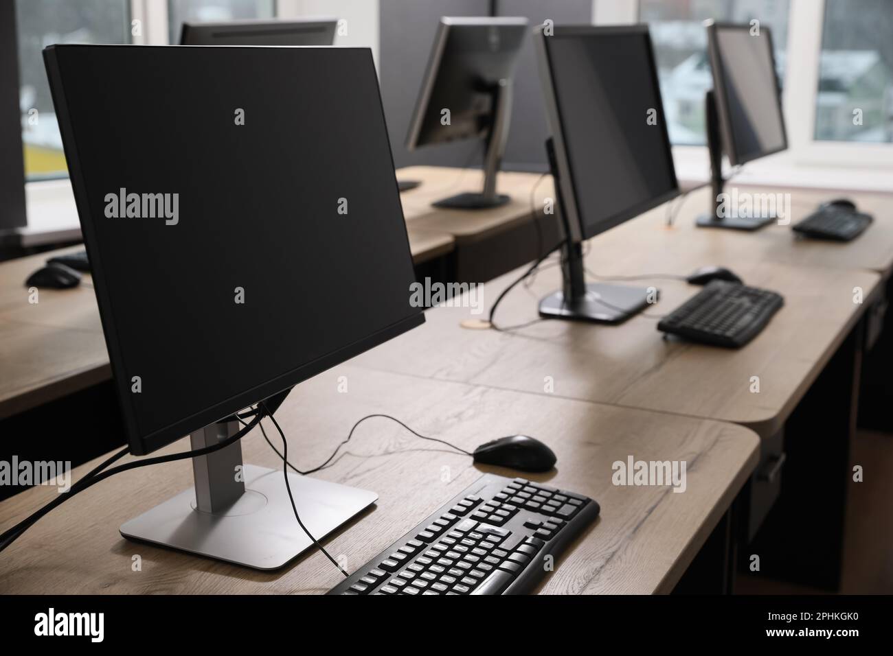 Many modern computers in open space office Stock Photo - Alamy