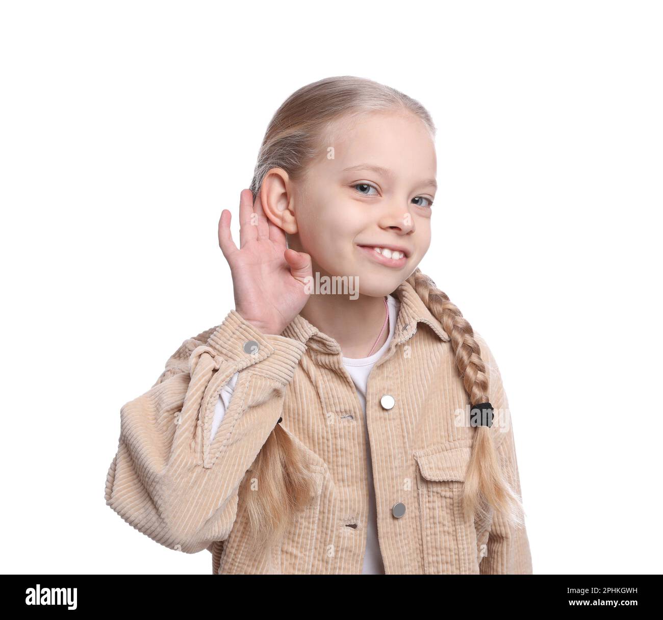 Cute little girl showing hand to ear gesture on white background Stock ...