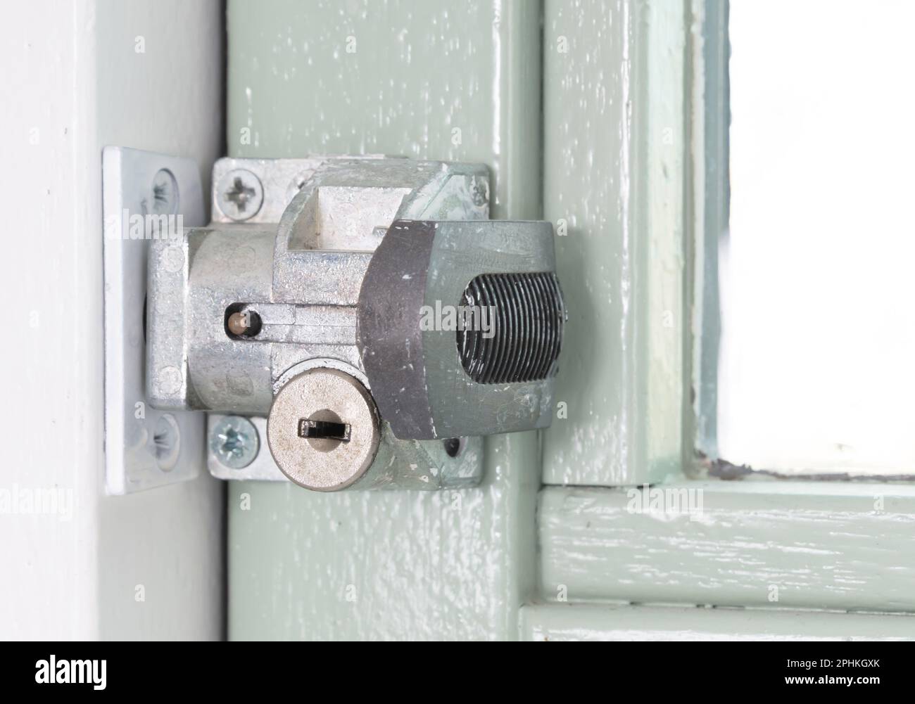 Simple lock on the inside of a window, selective focus Stock Photo - Alamy