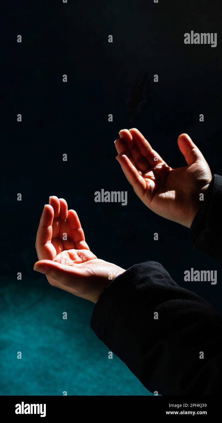 Islamic or ramadan vertical background photo. Muslim man praying with ...