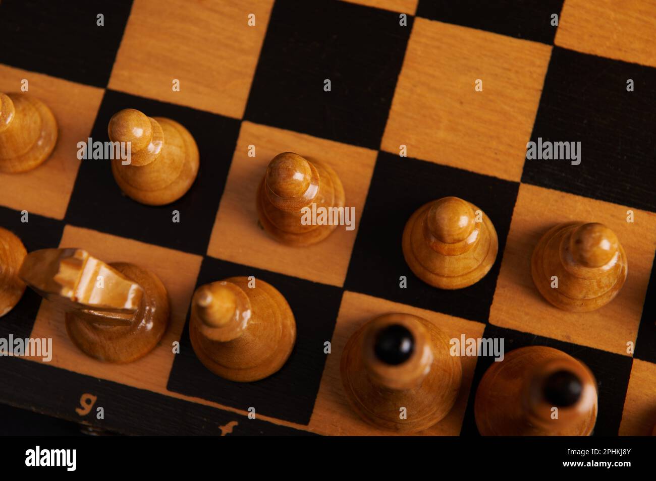 Top view white chess pieces standing in start position on chess board ...