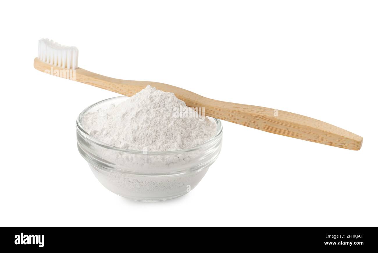 Glass bowl of tooth powder and brush on white background Stock Photo ...