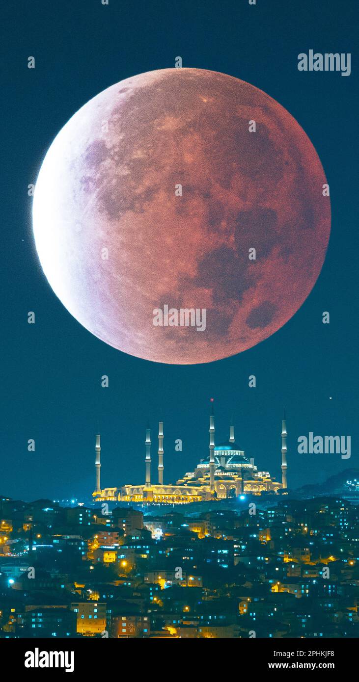 Camlica Mosque and lunar eclipse. Ramadan or islamic vertical ...
