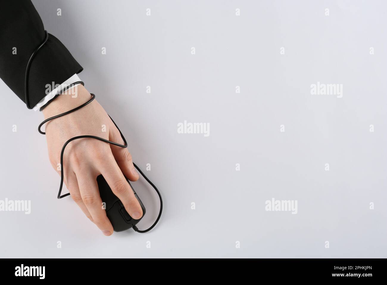 Internet addiction. Top view of man using computer mouse on white ...