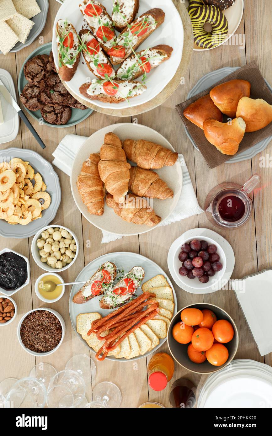 Brunch table setting with different delicious food, flat lay Stock ...