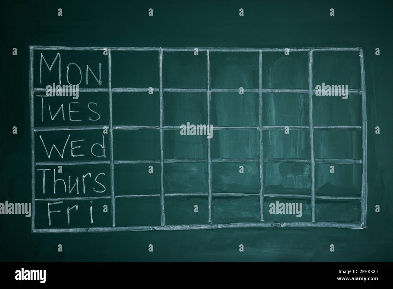 Weekly school timetable drawn on green chalkboard Stock Photo - Alamy