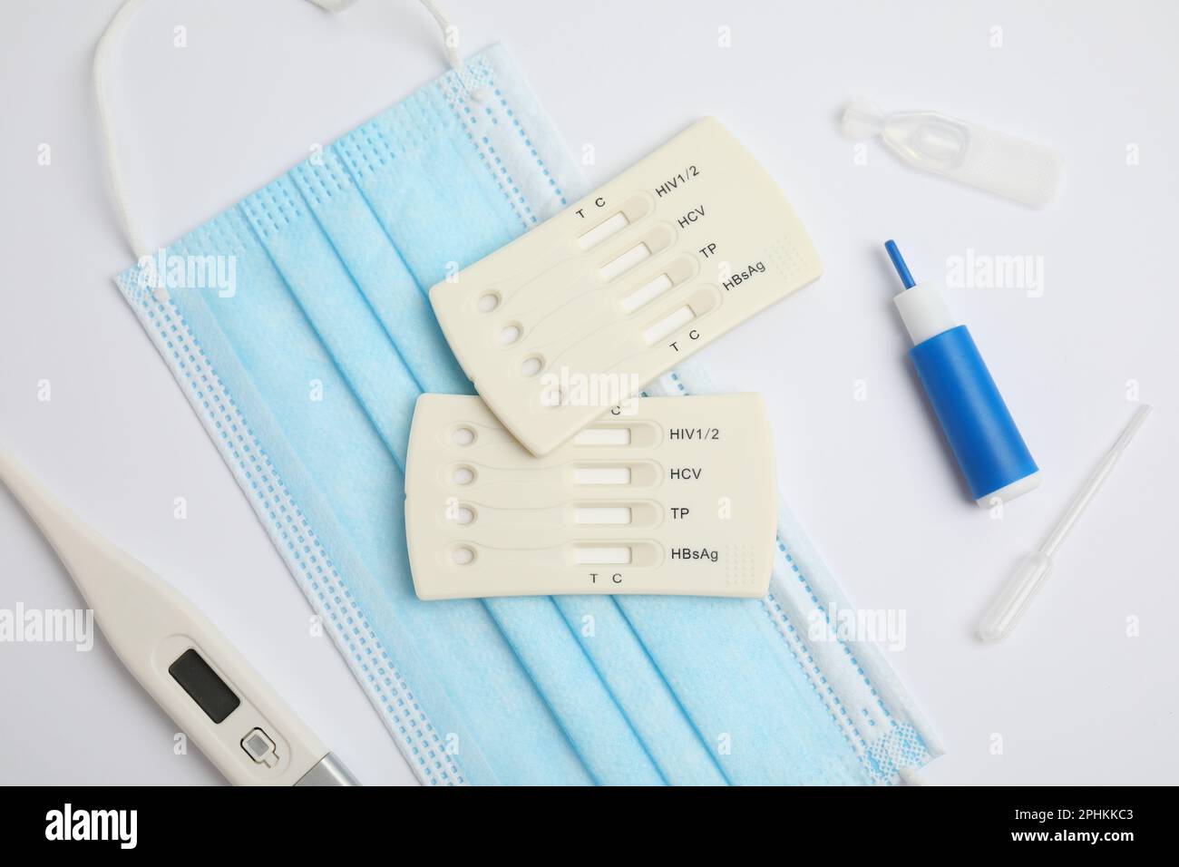Disposable express test kit for hepatitis on white background, flat lay ...