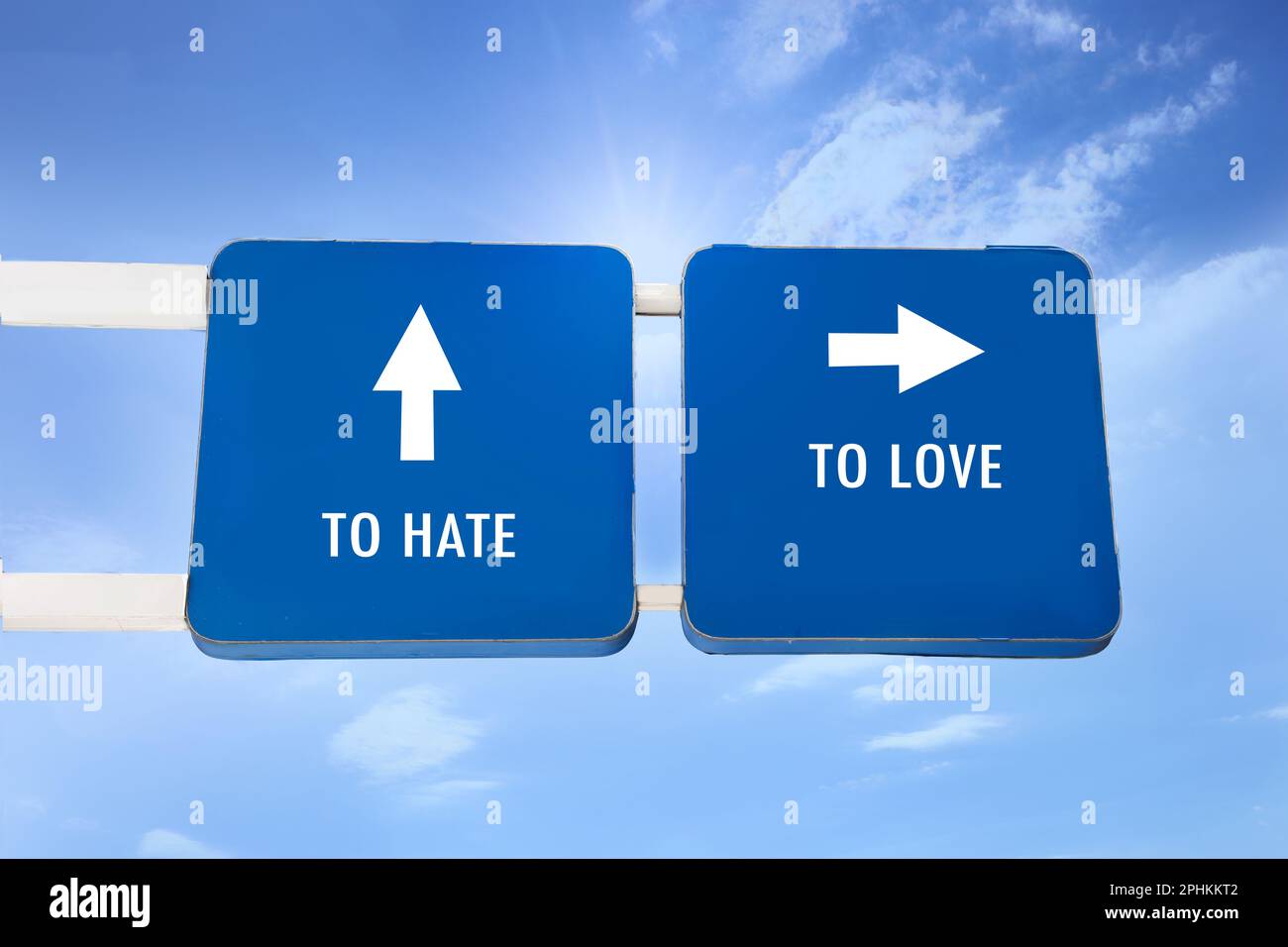 Road signs with different directions - TO HATE or TO LOVE outdoors ...