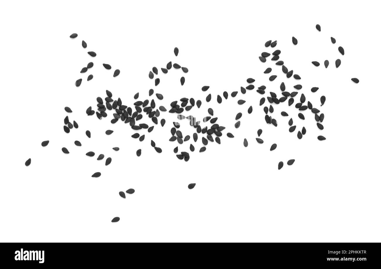 Scattered black sesame seeds on white background, top view Stock Photo ...