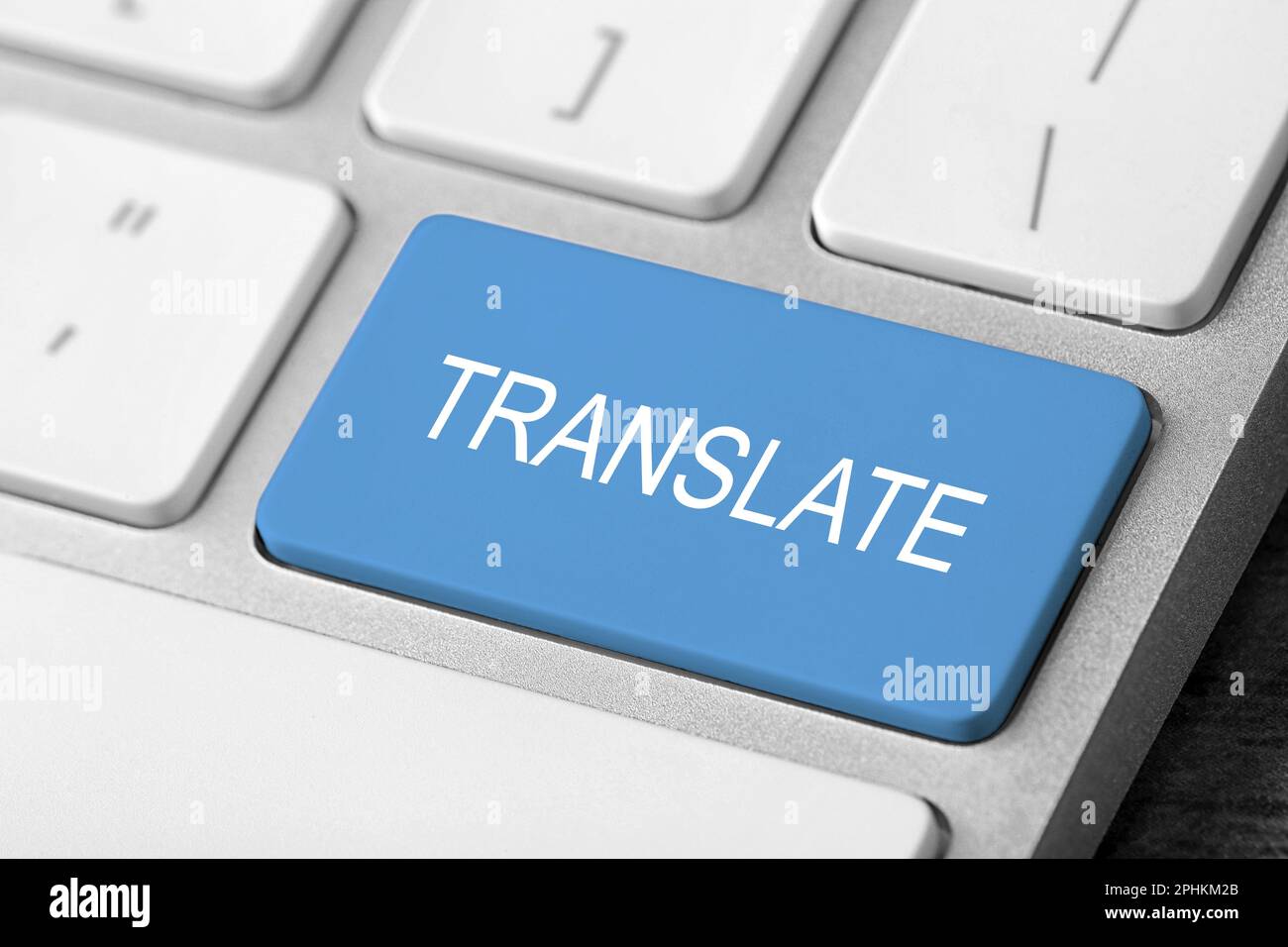 Blue Button With Word Translate On Computer Keyboard Closeup View