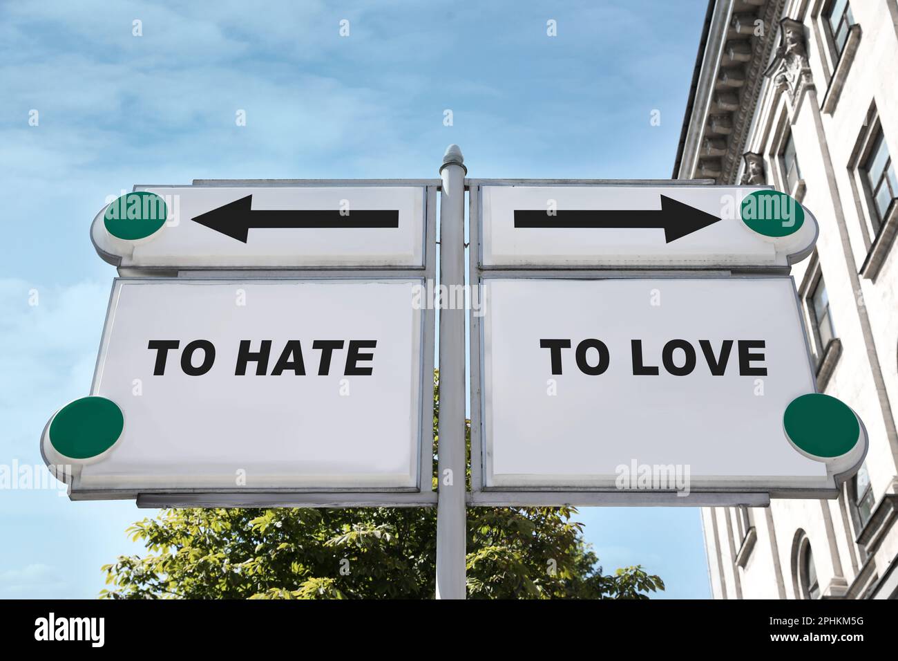 Road signs with different directions - TO HATE or TO LOVE outdoors ...
