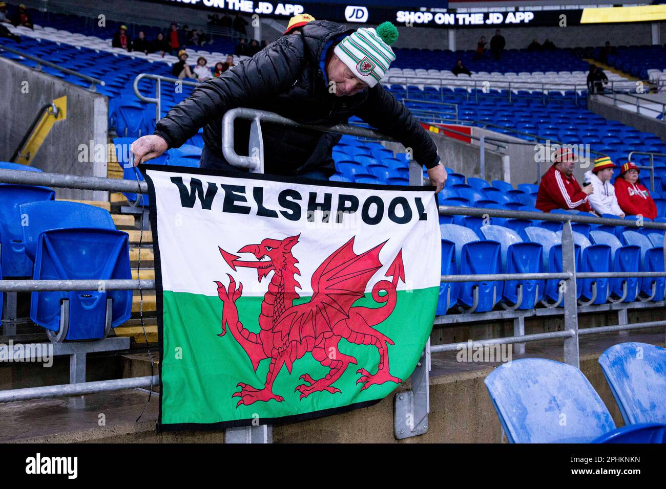 Cardiff, UK. 28/03/2023. A Welsh flag is placed in front of the Canton ...