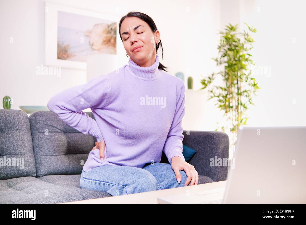 Bad back woman hi-res stock photography and images - Alamy