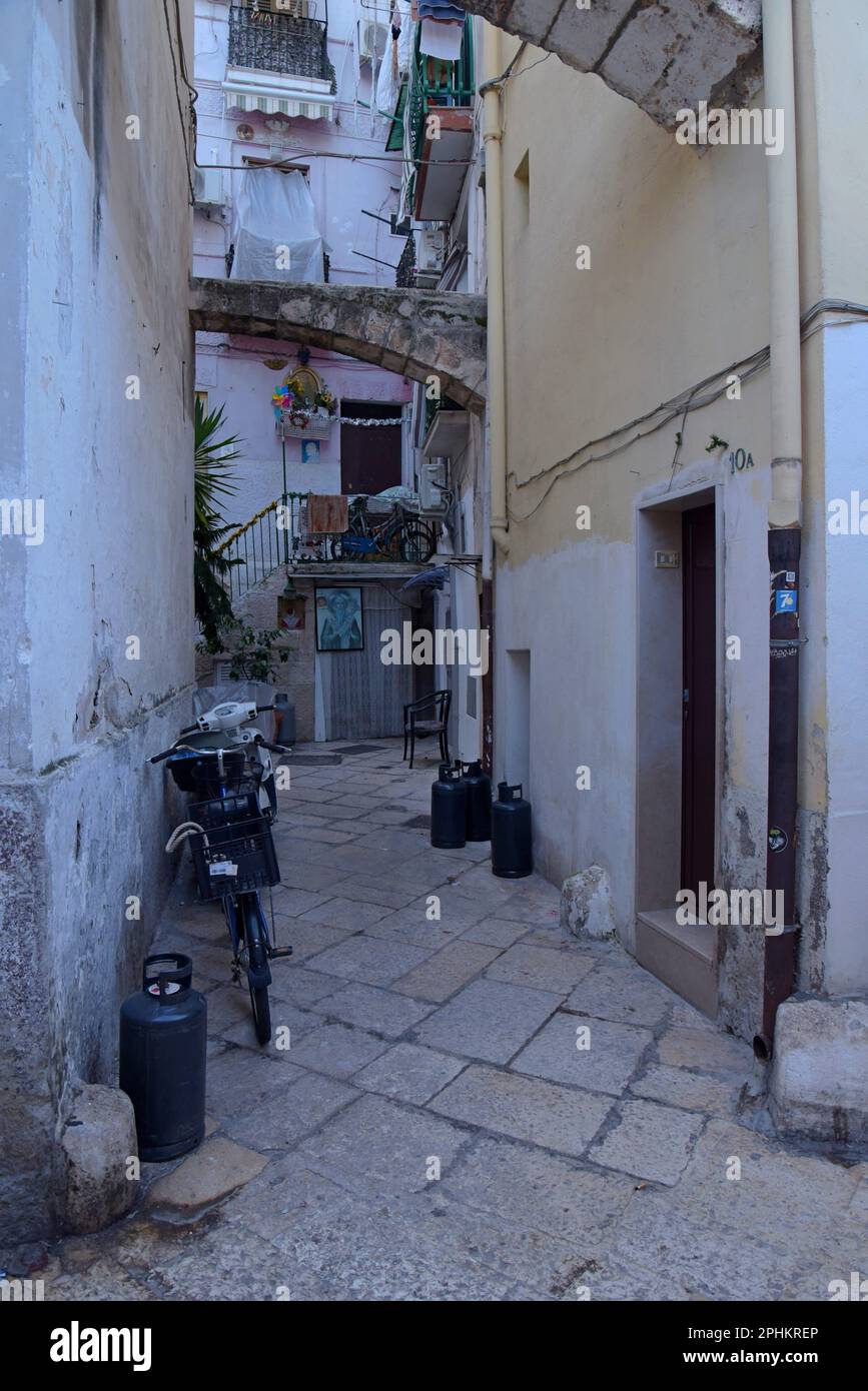 A narrow winding historic alley way in the Barivecchia, or Old Bari ...