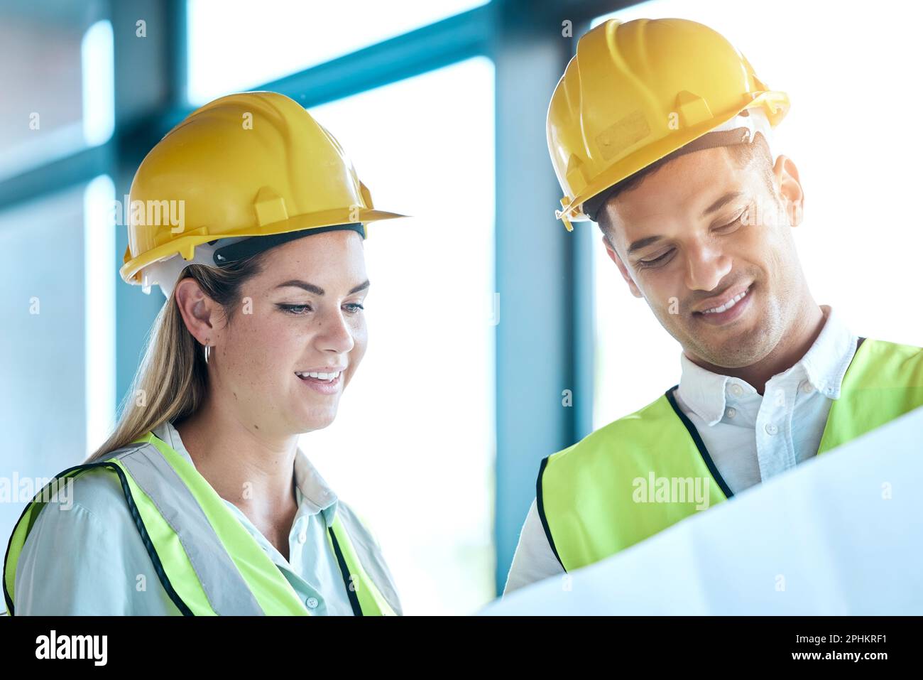 Architect, team and planning with blueprint for construction or ...