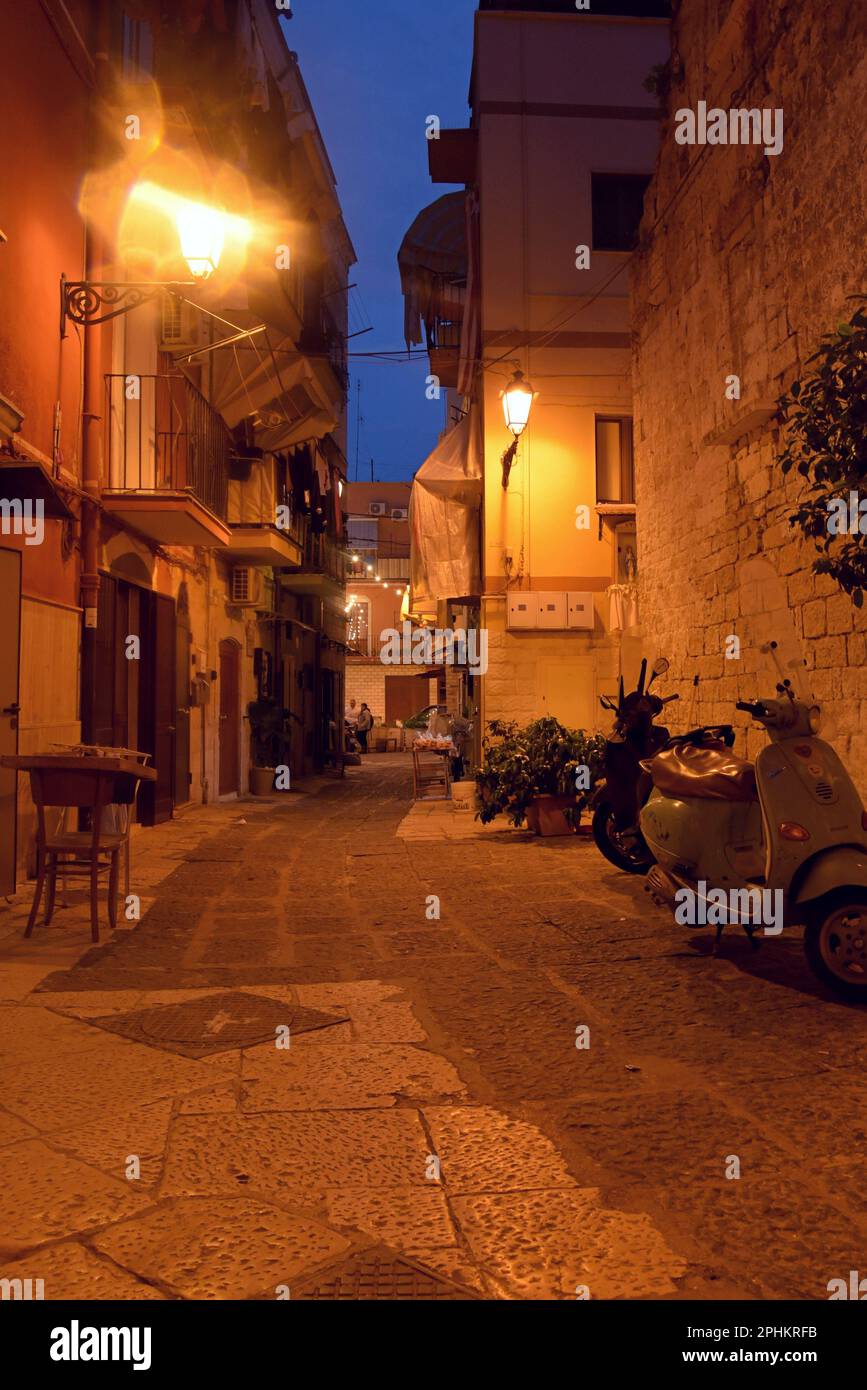 A narrow winding historic alley way in the Barivecchia, or Old Bari ...