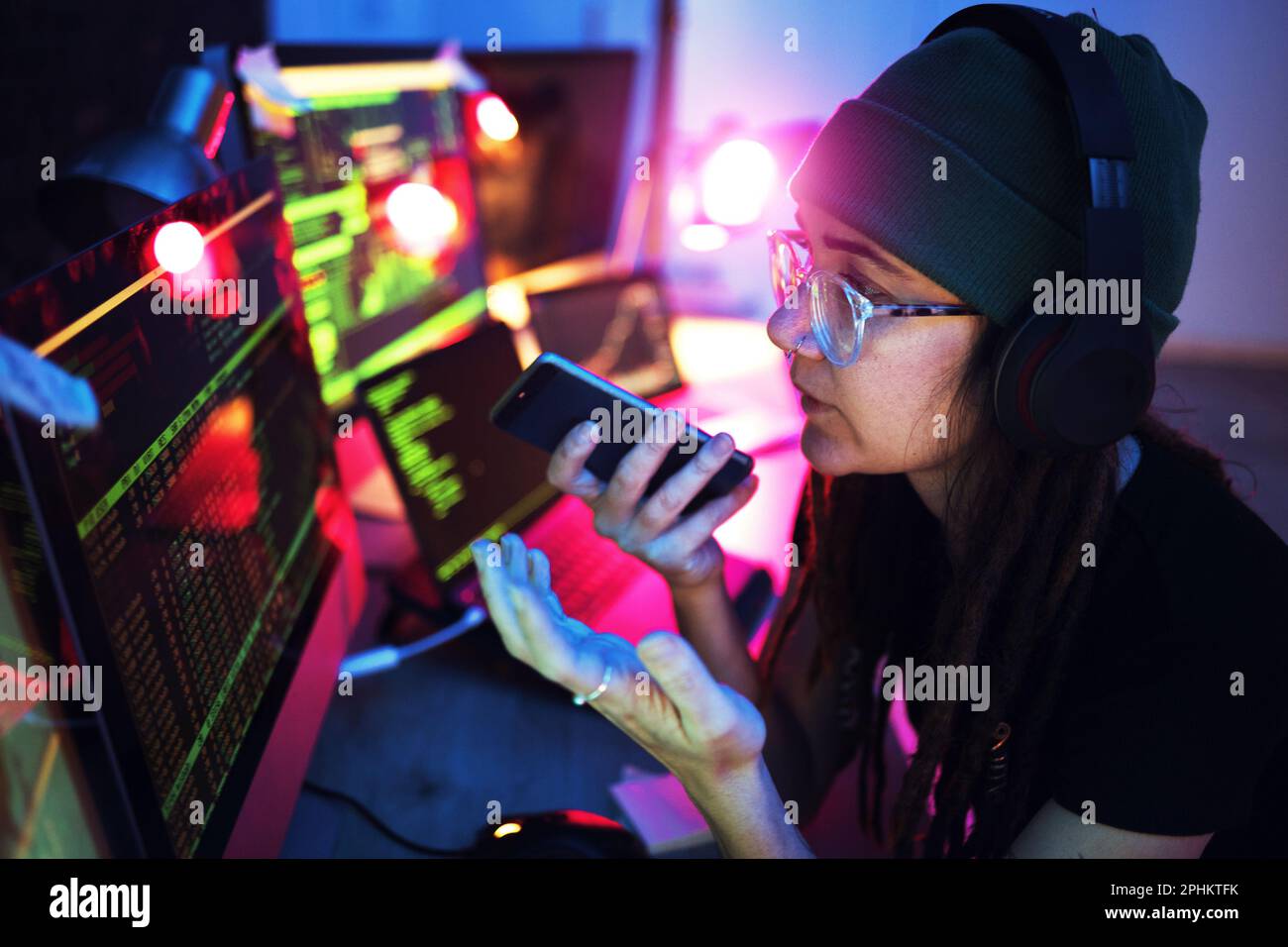 Computer screen, phone call or girl hacker in basement in dark room at ...
