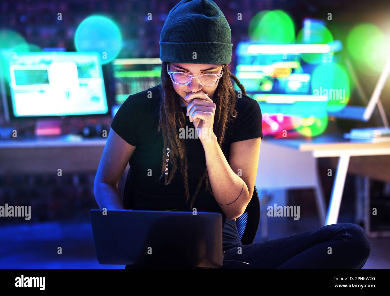 Laptop, woman and hacker thinking in home for programming, software or ...