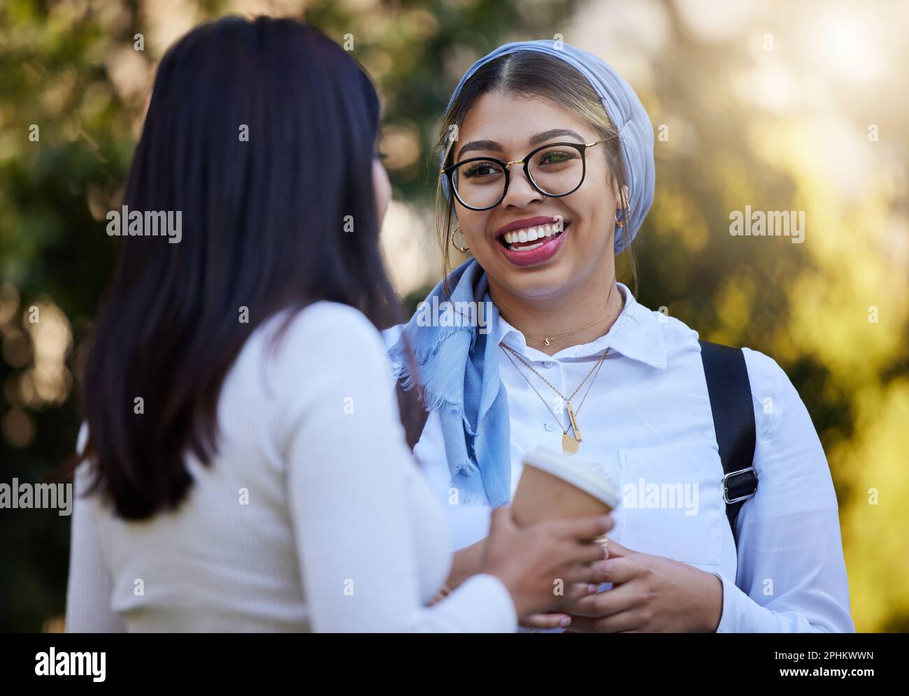 Muslim girls meeting friends hi-res stock photography and images - Alamy