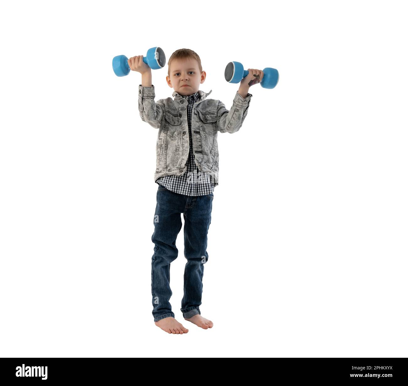 Young boy 6-9 years old with dumbbells isolated on white background ...