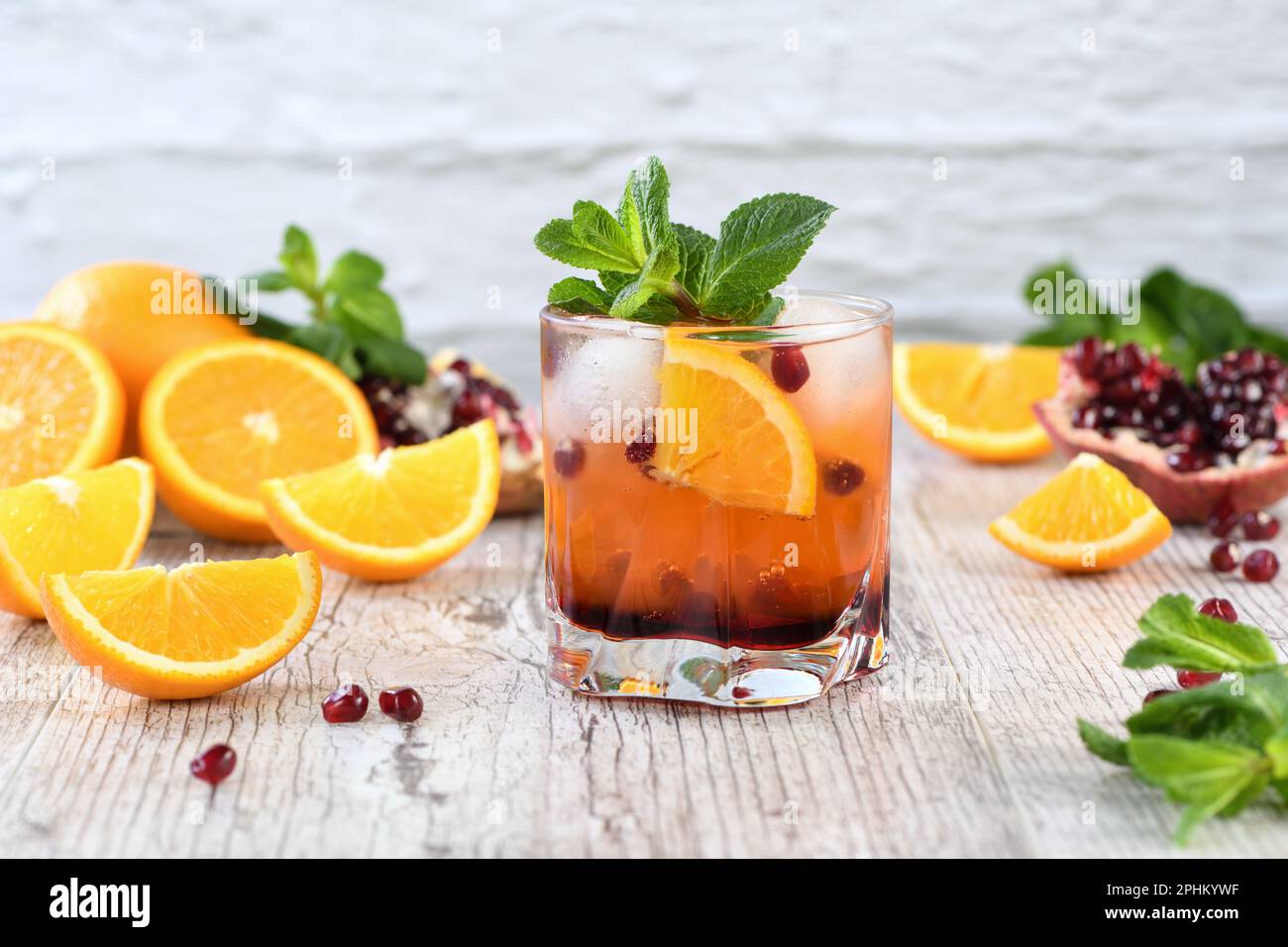 The cocktail is made from pomegranate and orange juice with tequila or ...