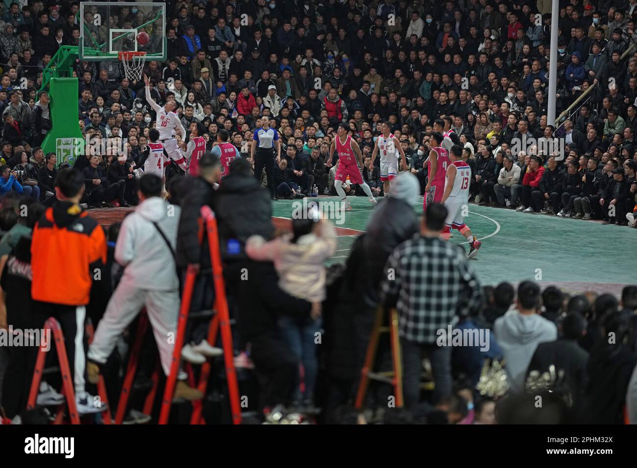 Taijiang, China's Guizhou Province. 25th Mar, 2023. People watch a ...