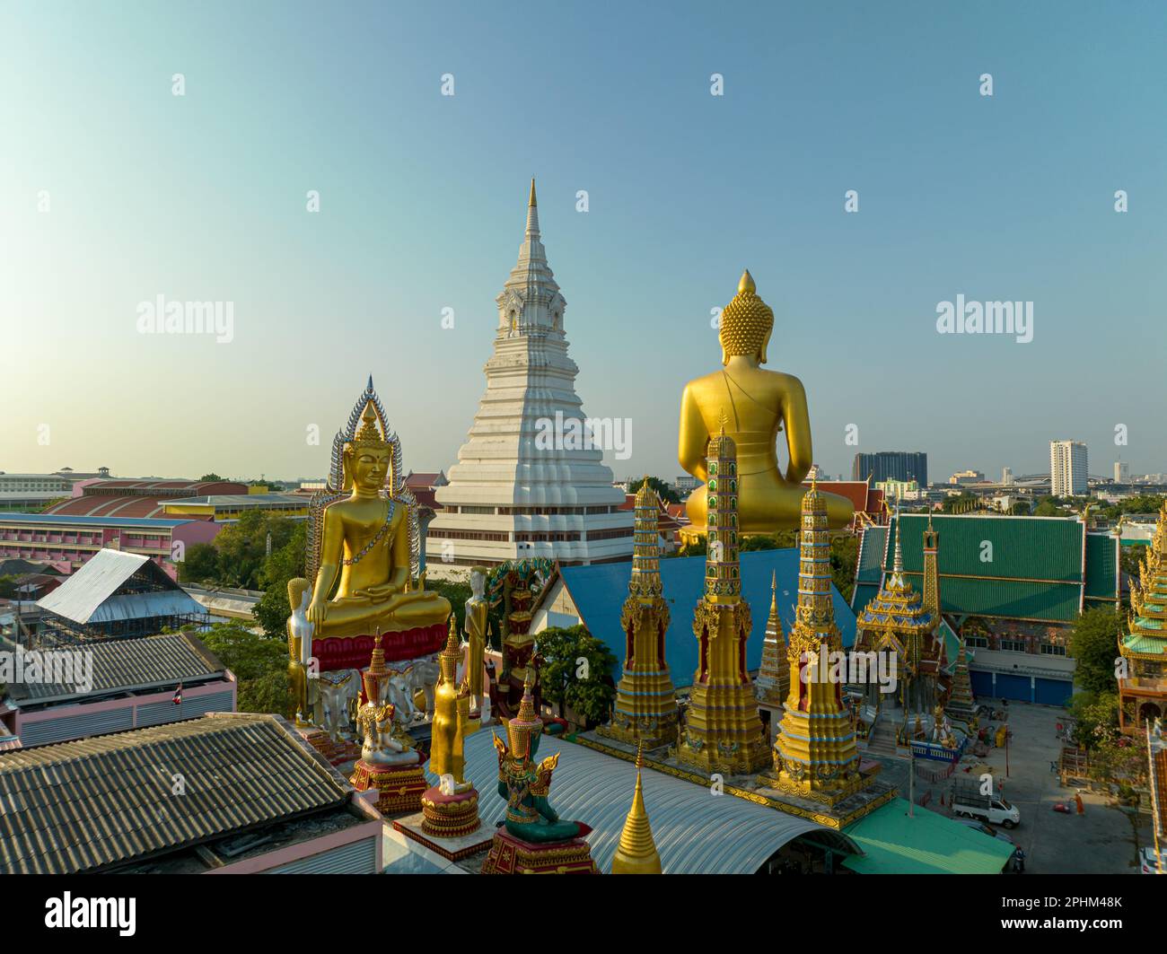 aerial view golden big Buddha Wat Paknam Phasi Charoen in sunset ...