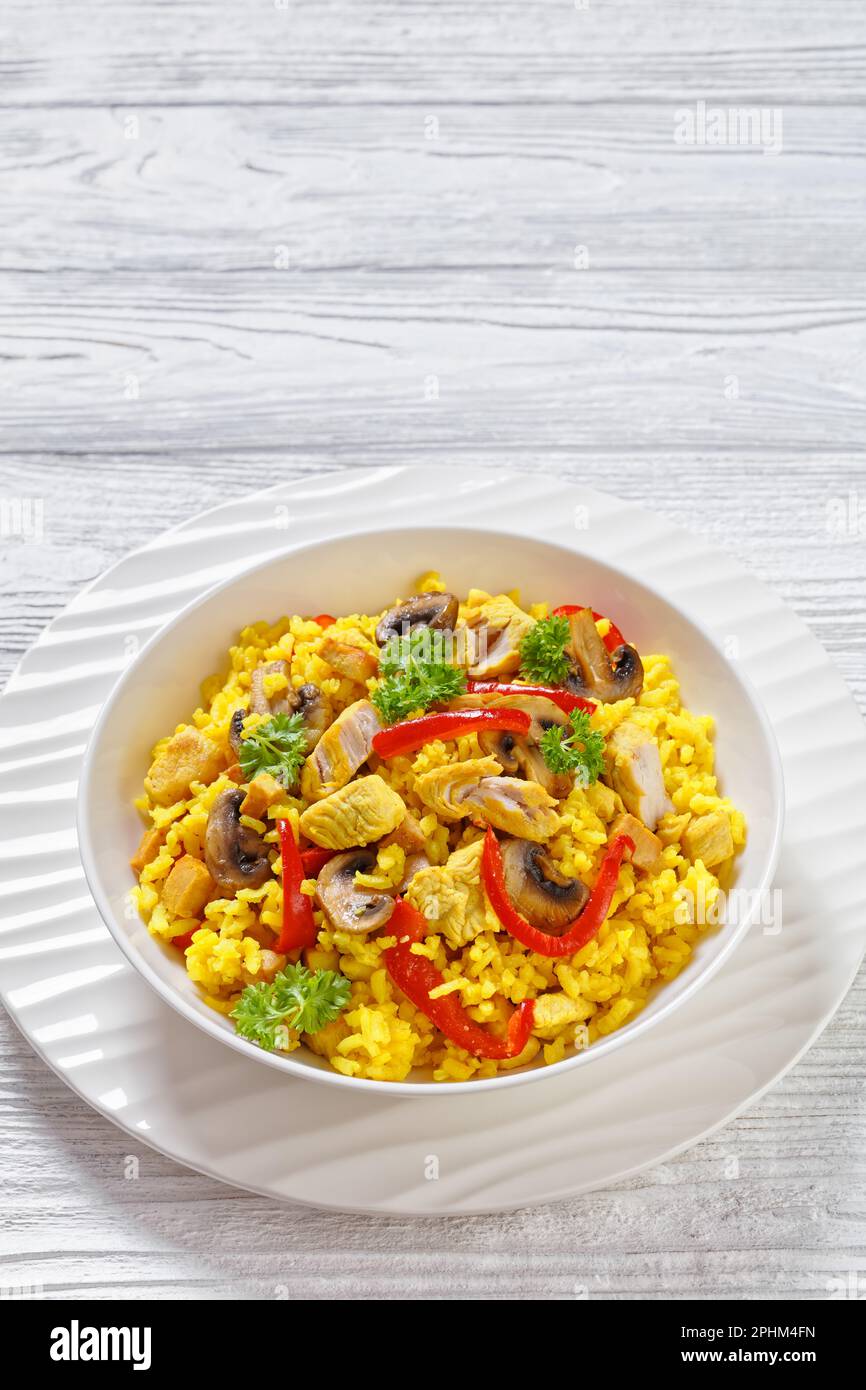 Chicken Paella of arborio rice, chicken fillet, mushrooms, julienned ...