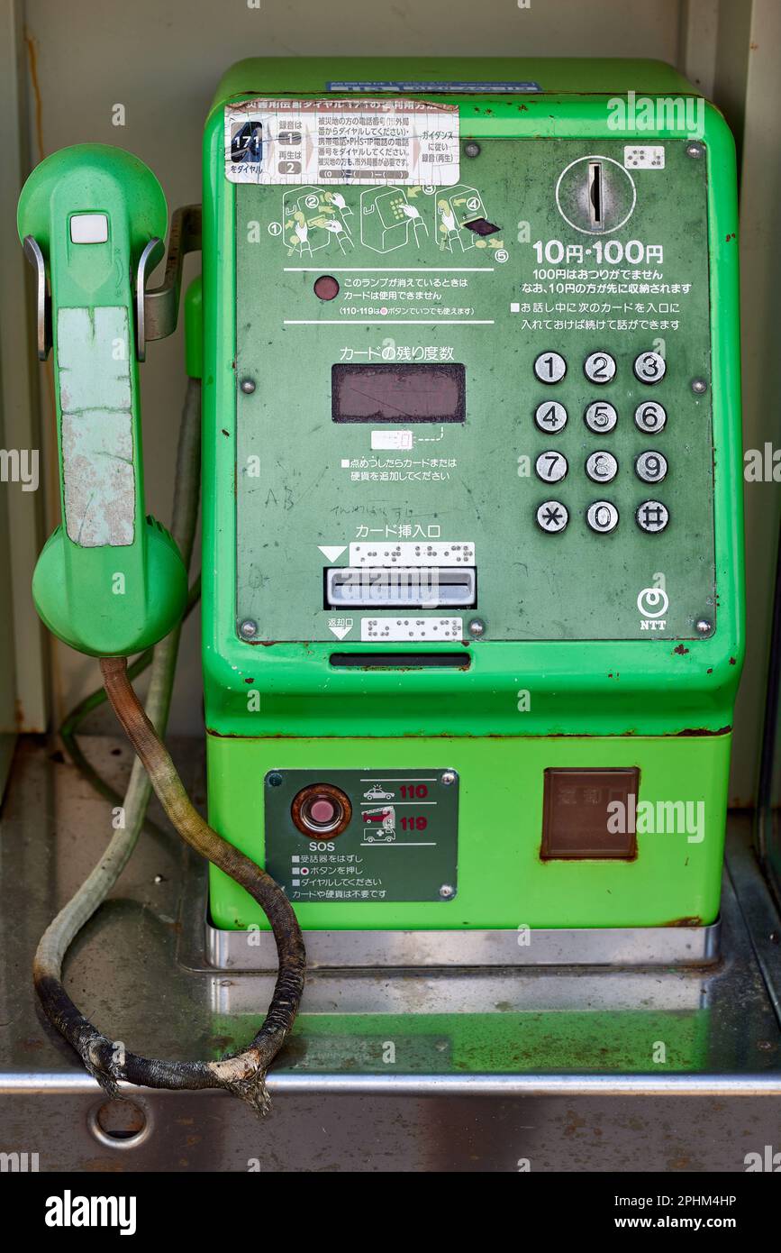 NTT public payphone, green; Okinawa, Japan Stock Photo - Alamy