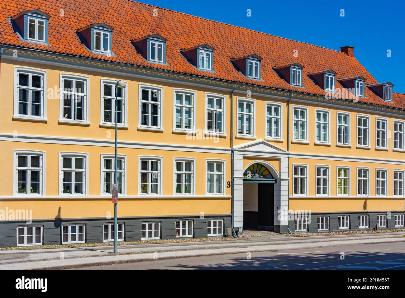 Yellow houses at the church complex at Soro, Denmark Stock Photo - Alamy