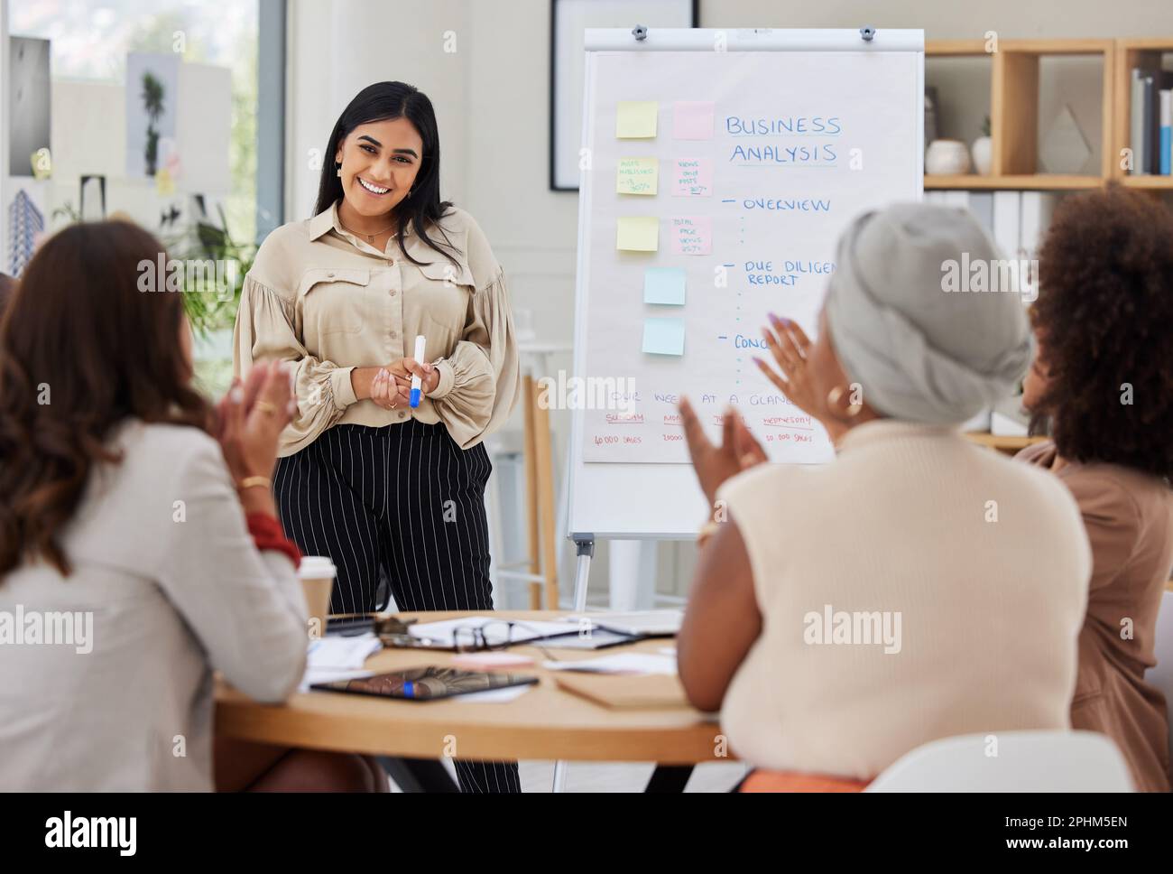 Business presentation, woman speaker and applause from women employee ...