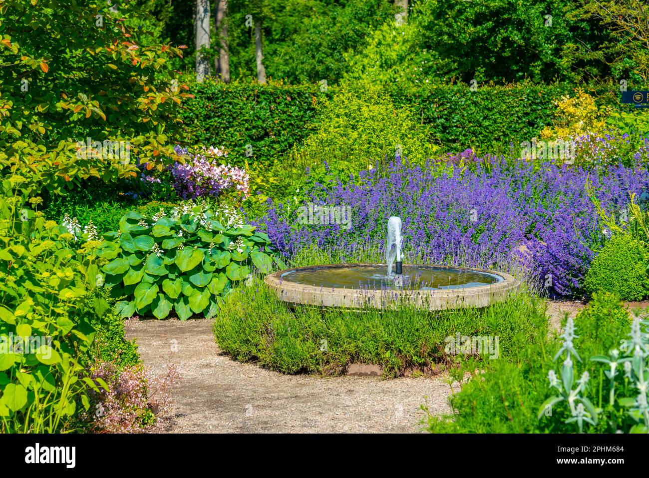 Gardens at Egeskov slot viewed during a sunny day in Denmark Stock ...