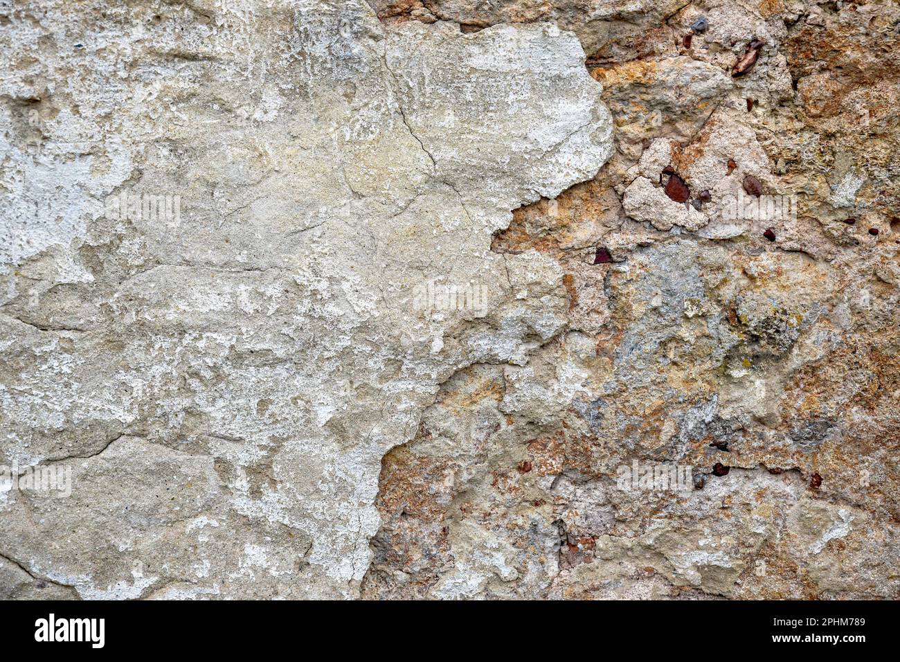 Texture of old stone wall with collapsed plaster. Background of shabby ...