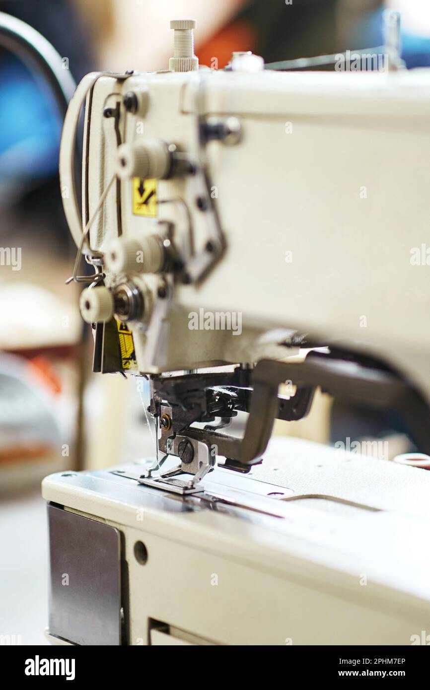 Textile factory workers machine hi-res stock photography and images - Alamy