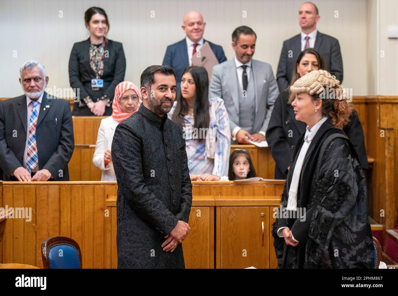 Humza Yousaf alongside Lord Advocate Dorothy Bain (right) as he is ...