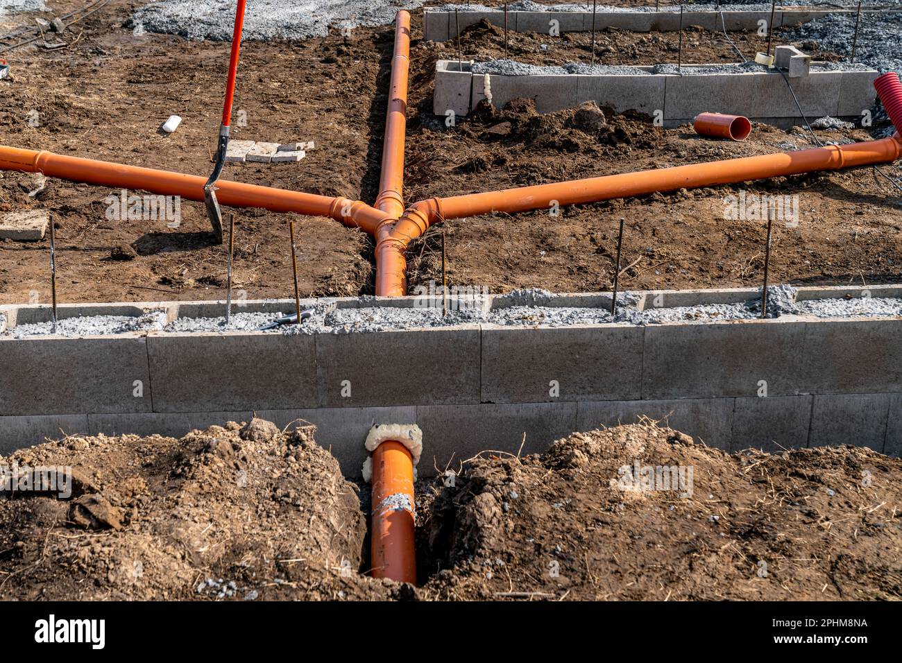 plastic pipe for sewage network in the base plate at the construction ...