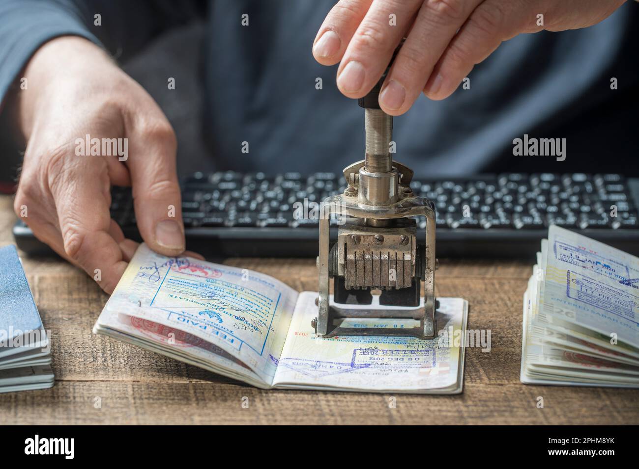 Immigration and passport control at the airport. Man border control ...