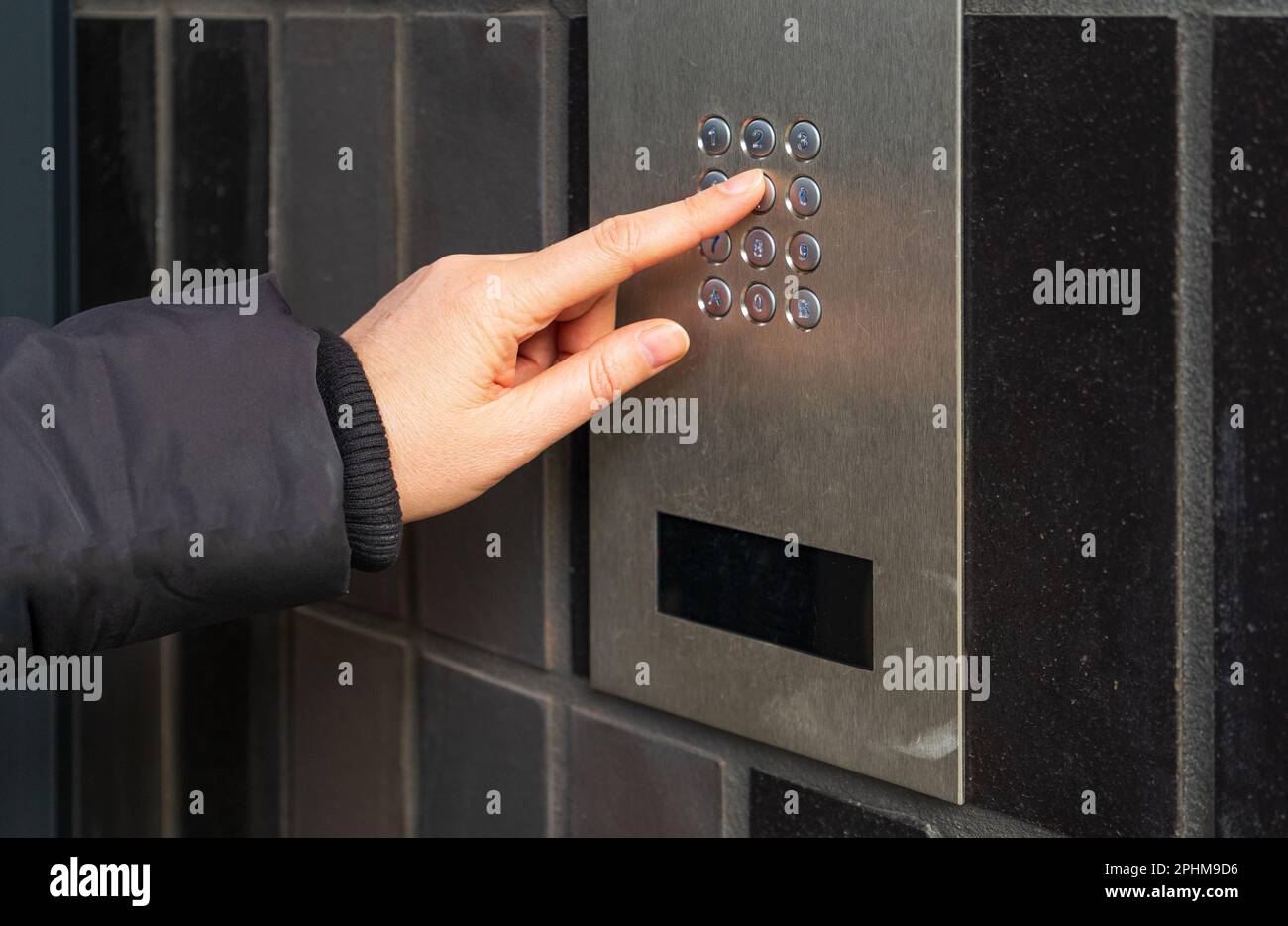 Secure Home System, Hand Pressing on Intercom Keypad, Using Door Phone, Doorphone, Entryphone ...