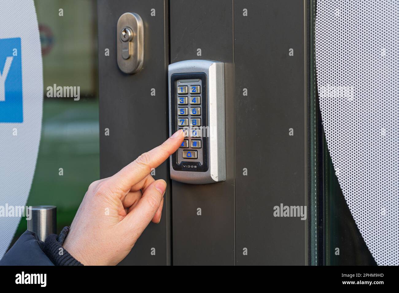Secure Home System, Hand Pressing on Intercom Keypad, Using Door Phone, Doorphone, Entryphone ...