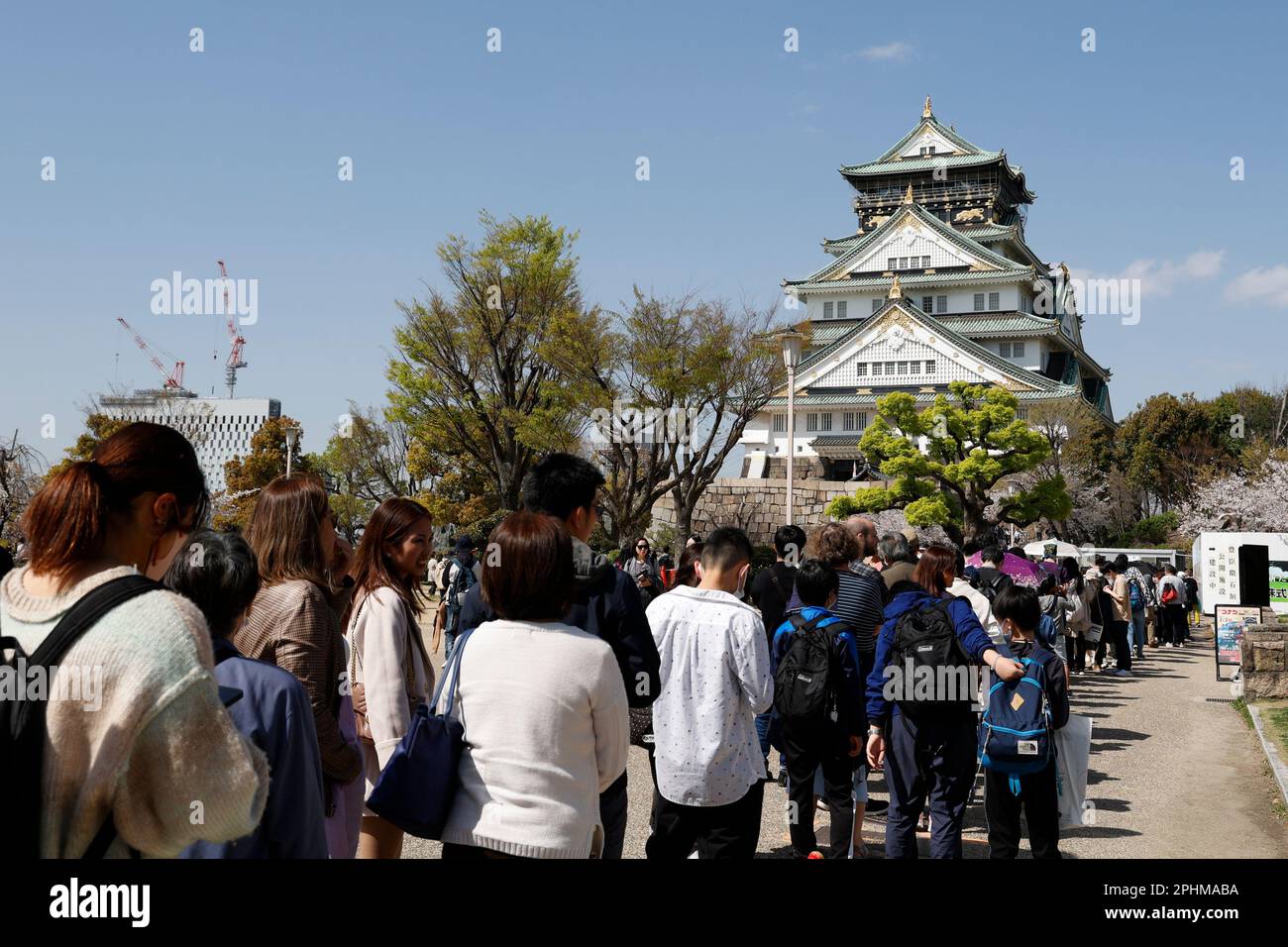 Osaka, Japan. March 28, 2023, People line up to enter to the Osaka ...