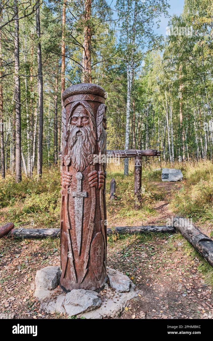 Idol of the god Perun in Wooden the Slavic sanctuary in nature park ...