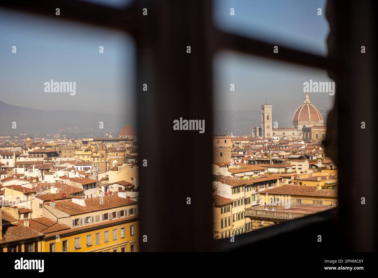 View from a Palazzo Pitti window looking across the Arno to the Duomo ...
