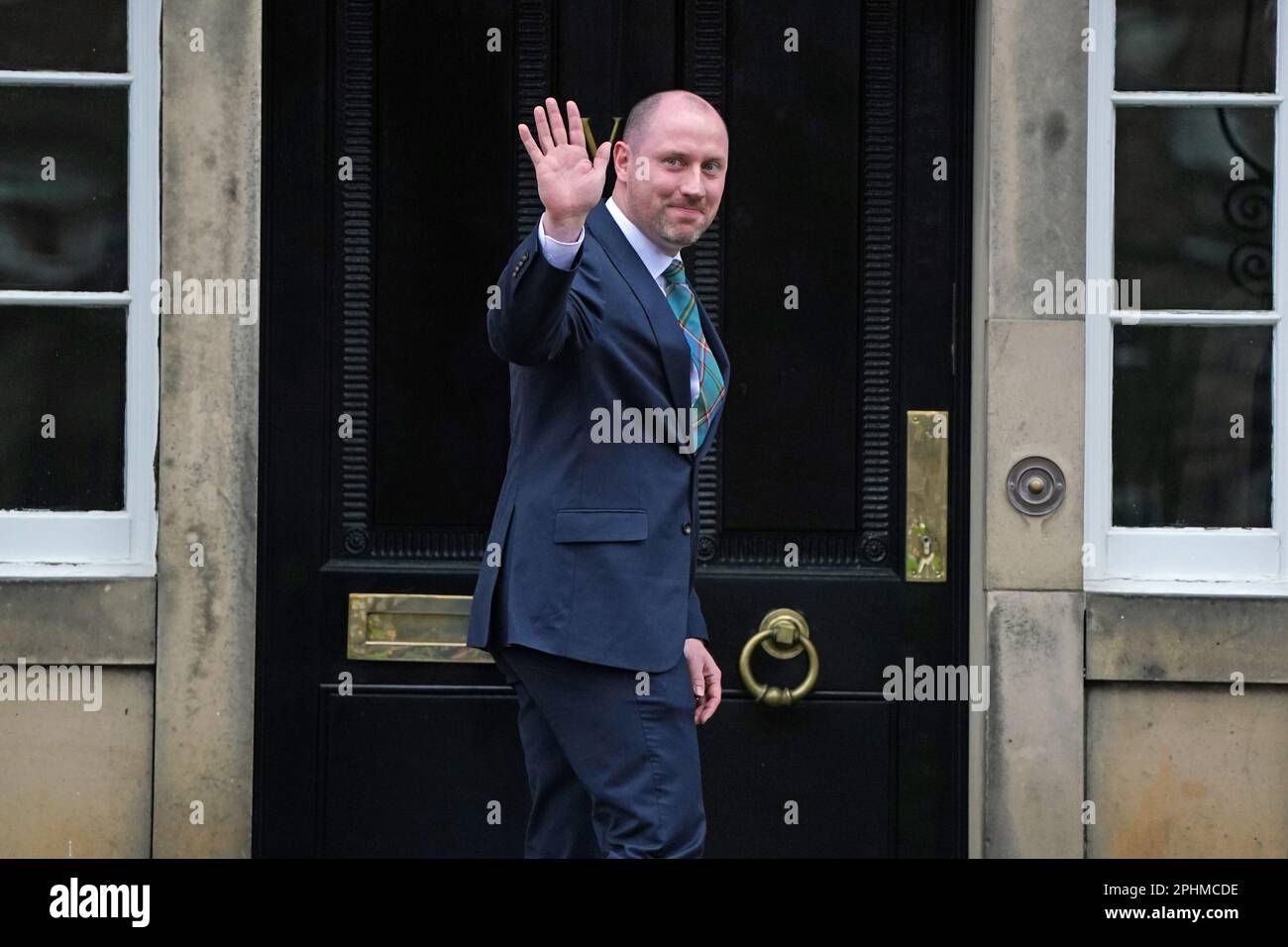 Neil Gray MSP waves as he arrives at Bute House, Edinburgh, ahead of ...