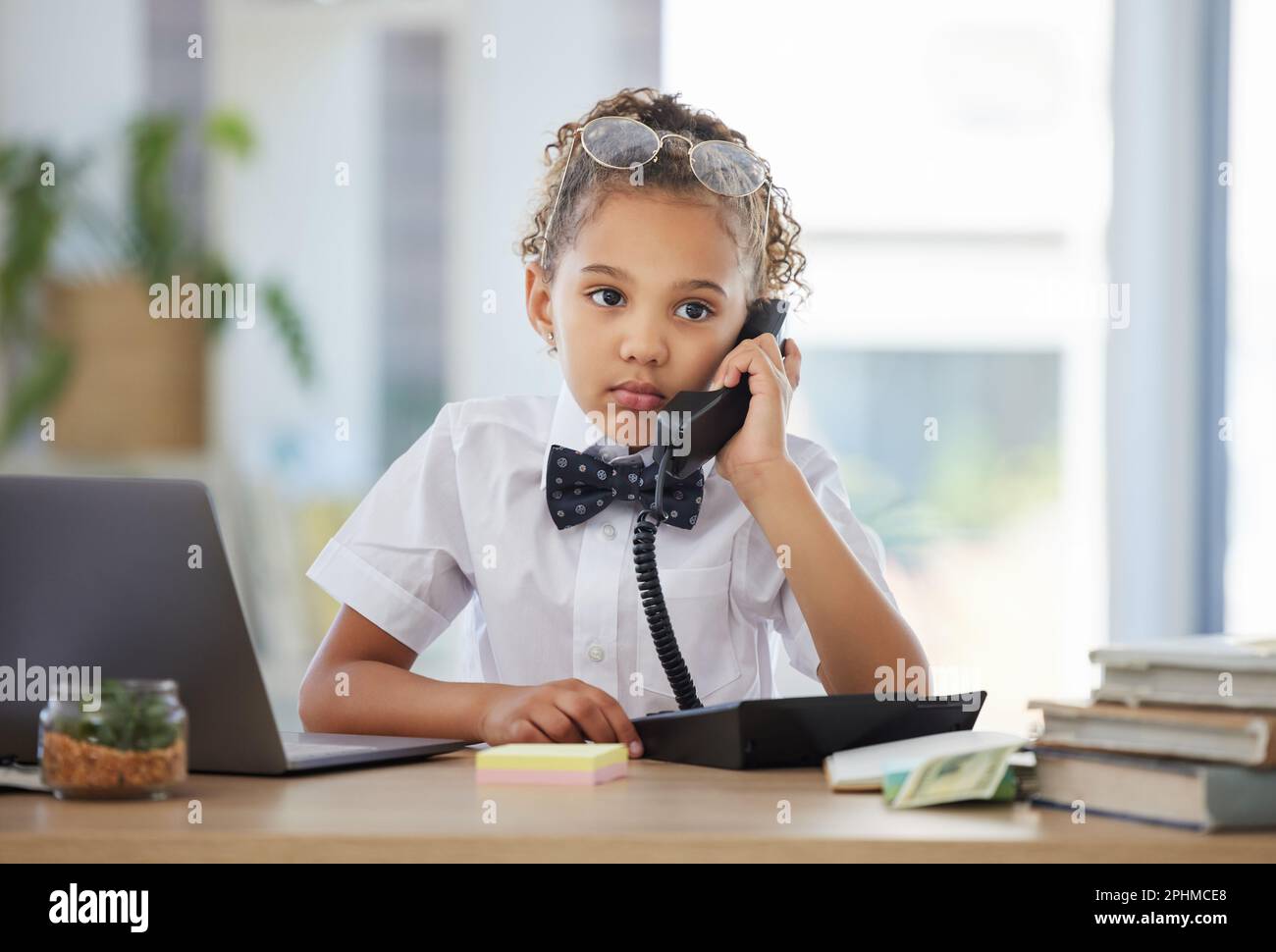 Kids, phone call and a girl playing in an office as a fantasy ...