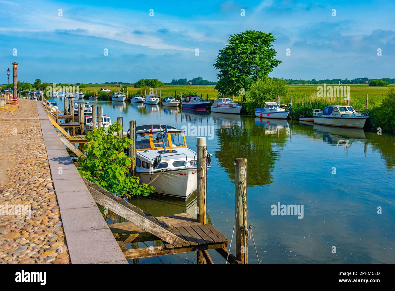 Boats mooring at a channel in Ribe, Denmark Stock Photo - Alamy