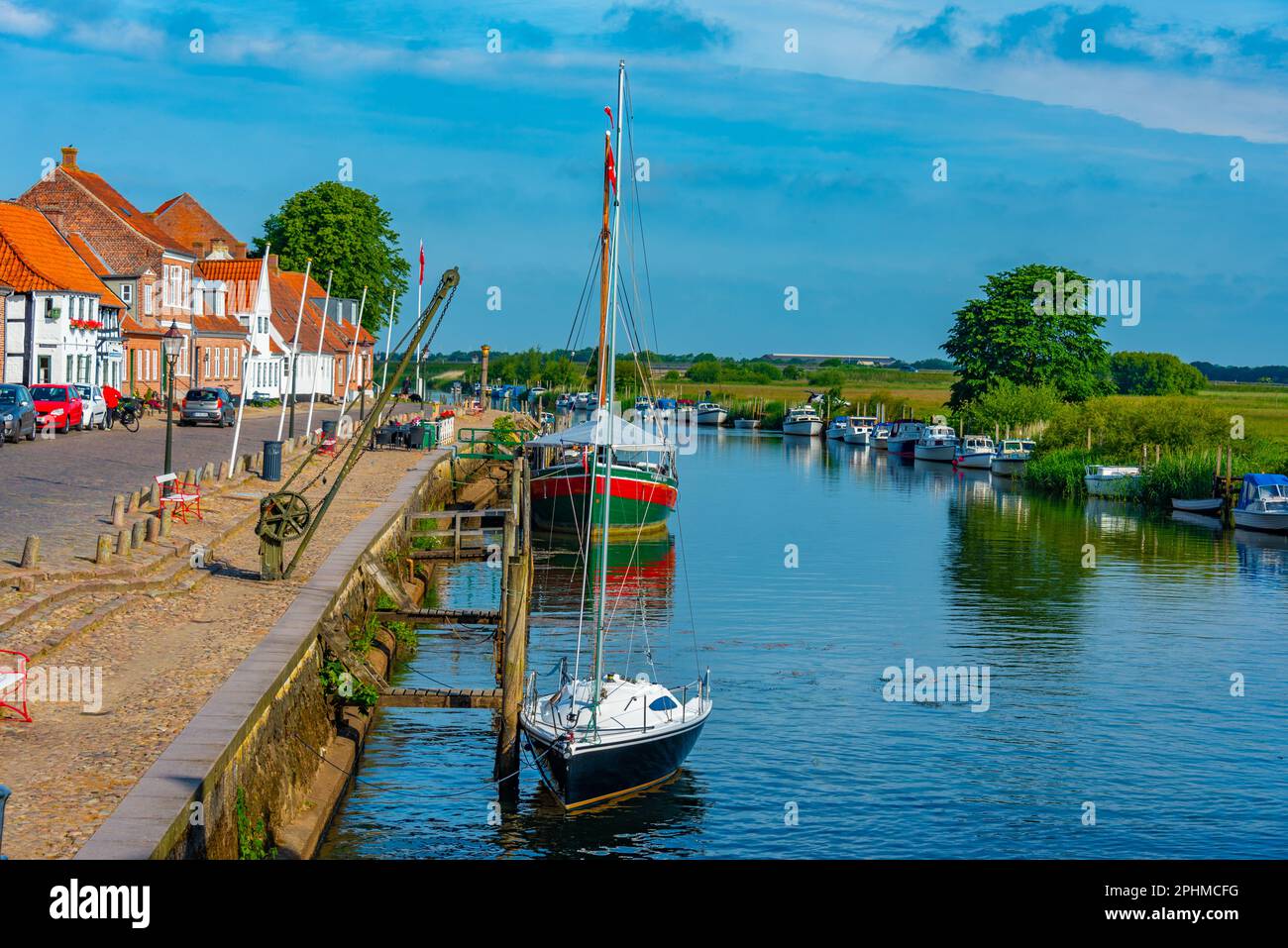 Boats mooring at a channel in Ribe, Denmark Stock Photo - Alamy
