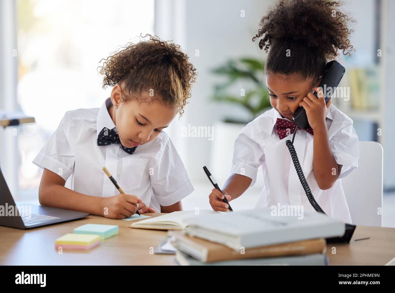 Planning, telephone and children boss in the office while working on a ...